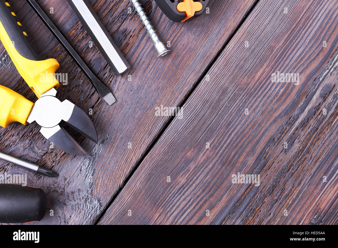 Tool kit on wooden backdrop Stock Photo - Alamy