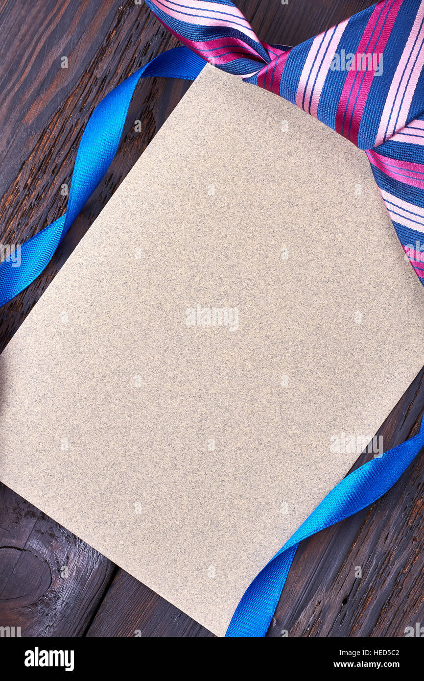 Card and necktie on wood Stock Photo - Alamy