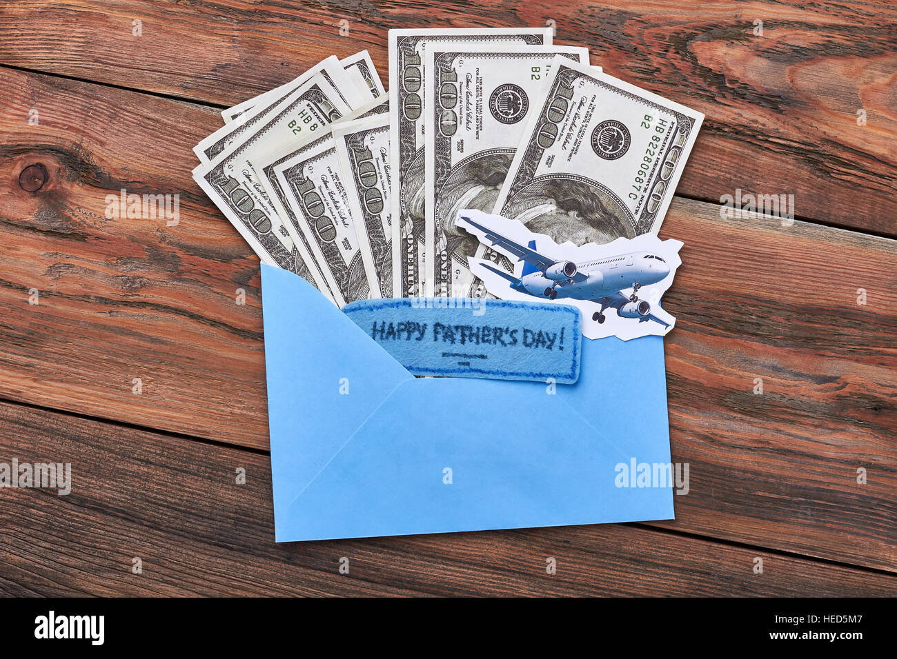 Plane on paper and money Stock Photo - Alamy
