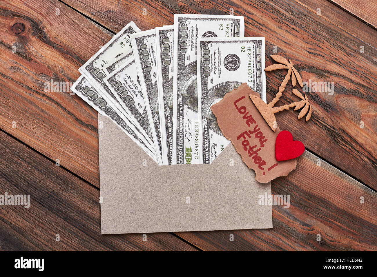 Palm and money in envelope Stock Photo - Alamy