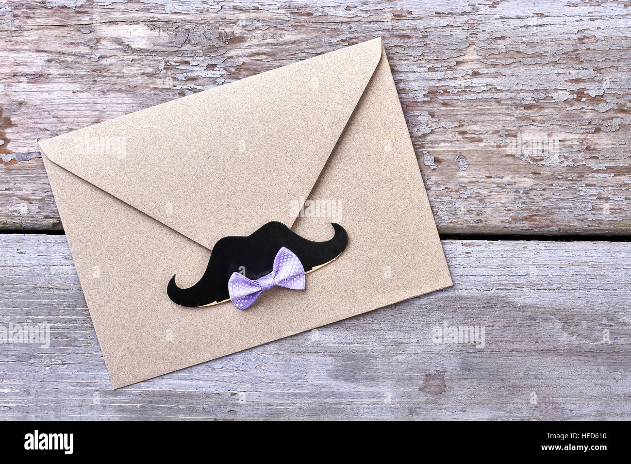 Bow tie on envelope Stock Photo - Alamy
