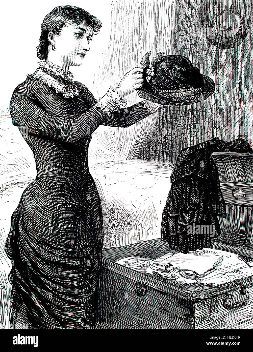 Victorian woman packing trunk, illustration from 1884 Chatterbox weekly ...