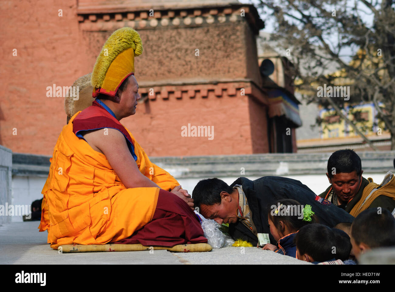 Xiahe: Tibetan Monastery Labrang at the Monlam Festival; 2 higher monks ...