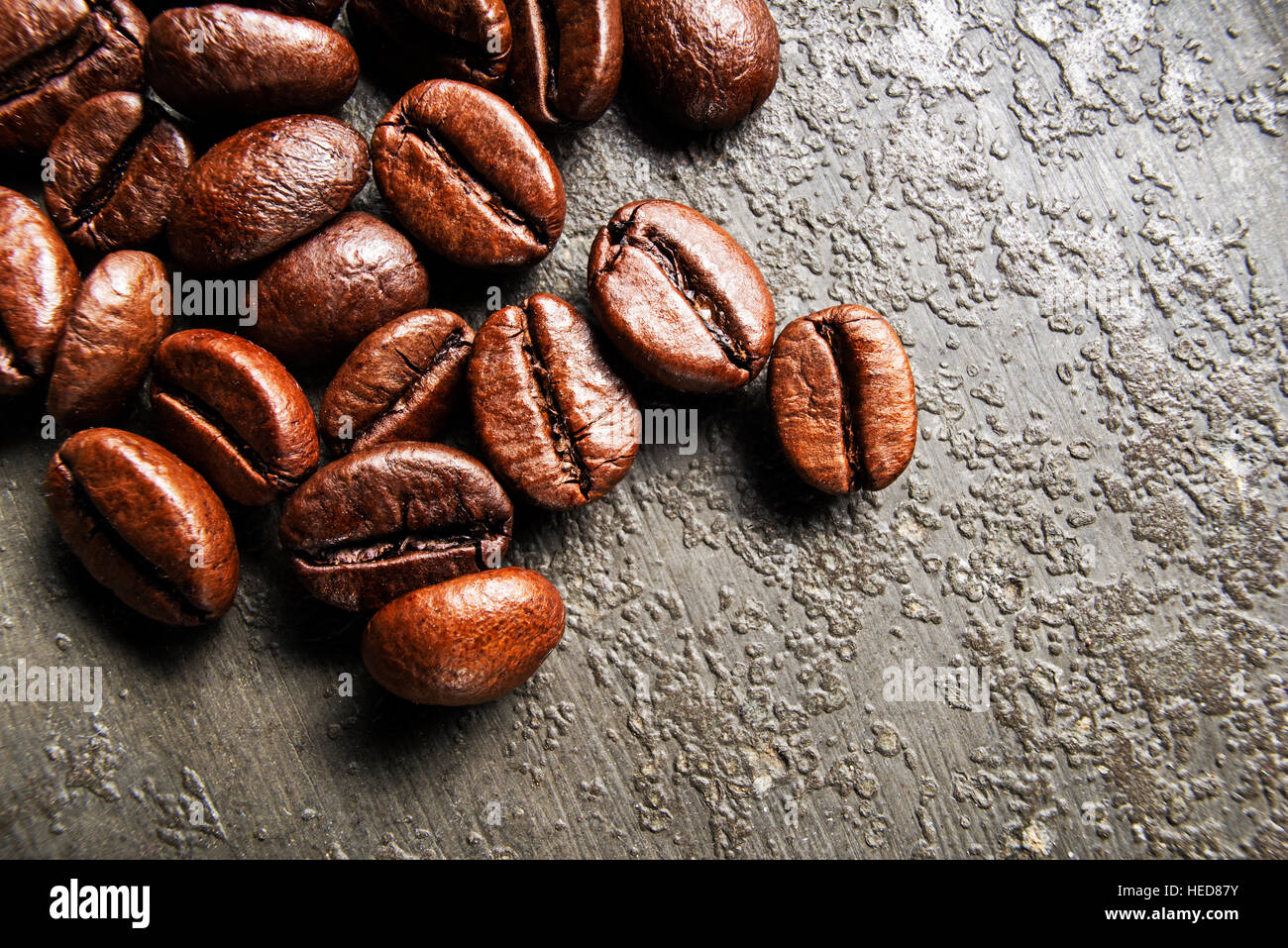 Coffee beans on gray background on close up Stock Photo - Alamy