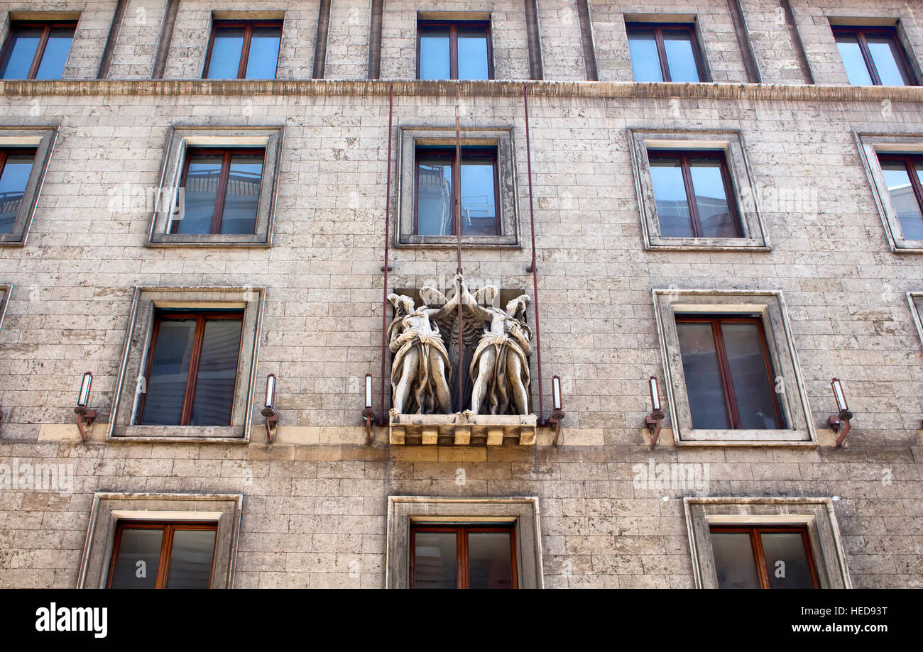 Bottom view of old, historical building in Berlin. Statues are in the ...