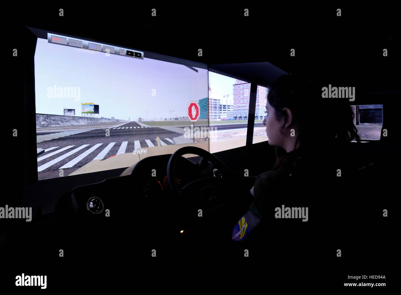 An Israeli female soldier inside a training simulation device for ...