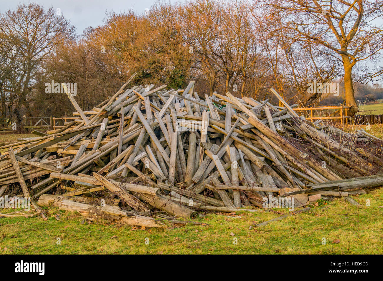 A bonfire woodpile in a winter field Stock Photo - Alamy