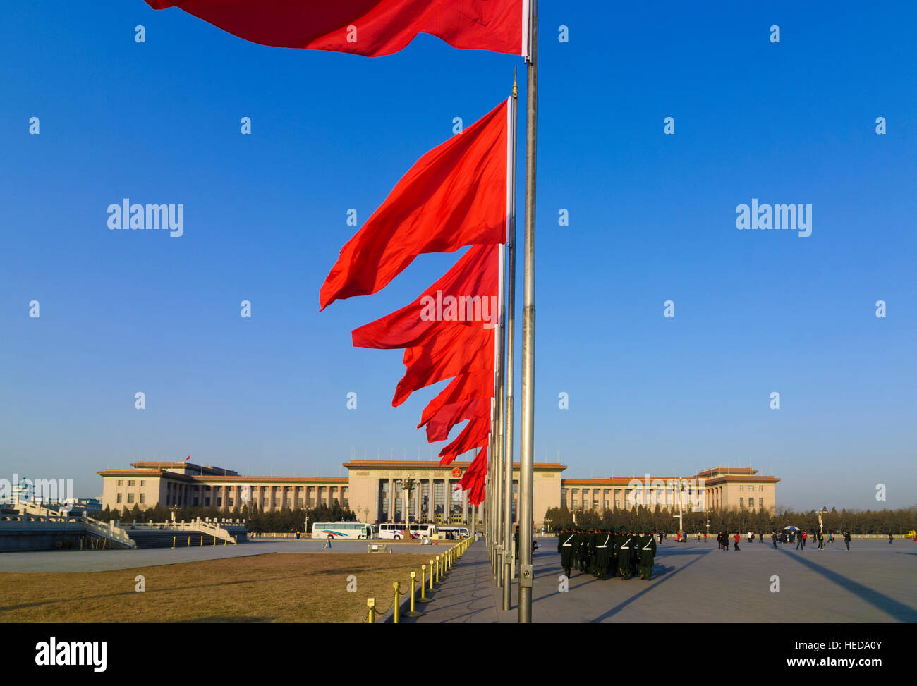 Peking: Tiananmen Square; Large hall of the people, red flags, Beijing ...