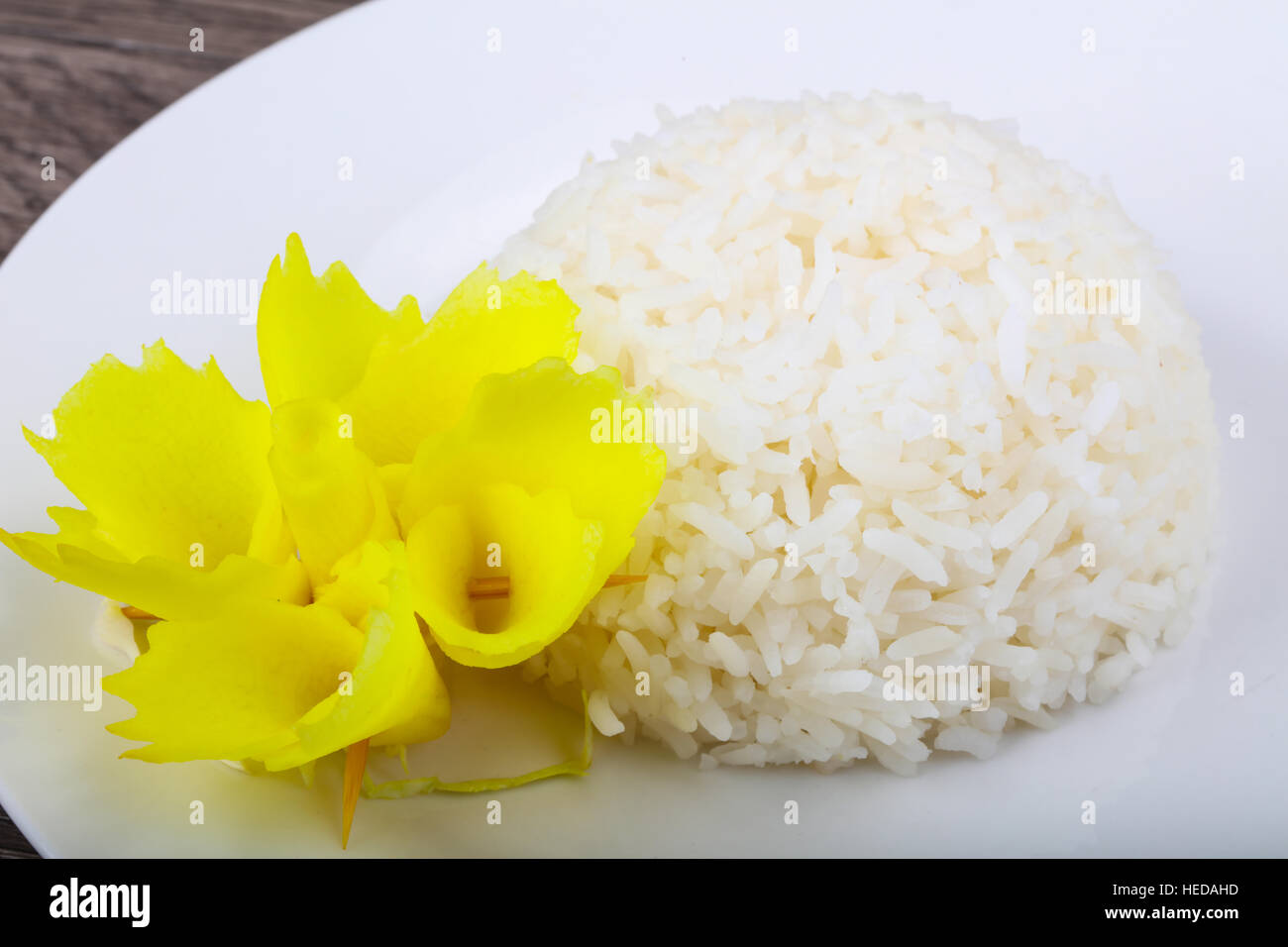 Hot long Steamed rice on the plate Stock Photo - Alamy