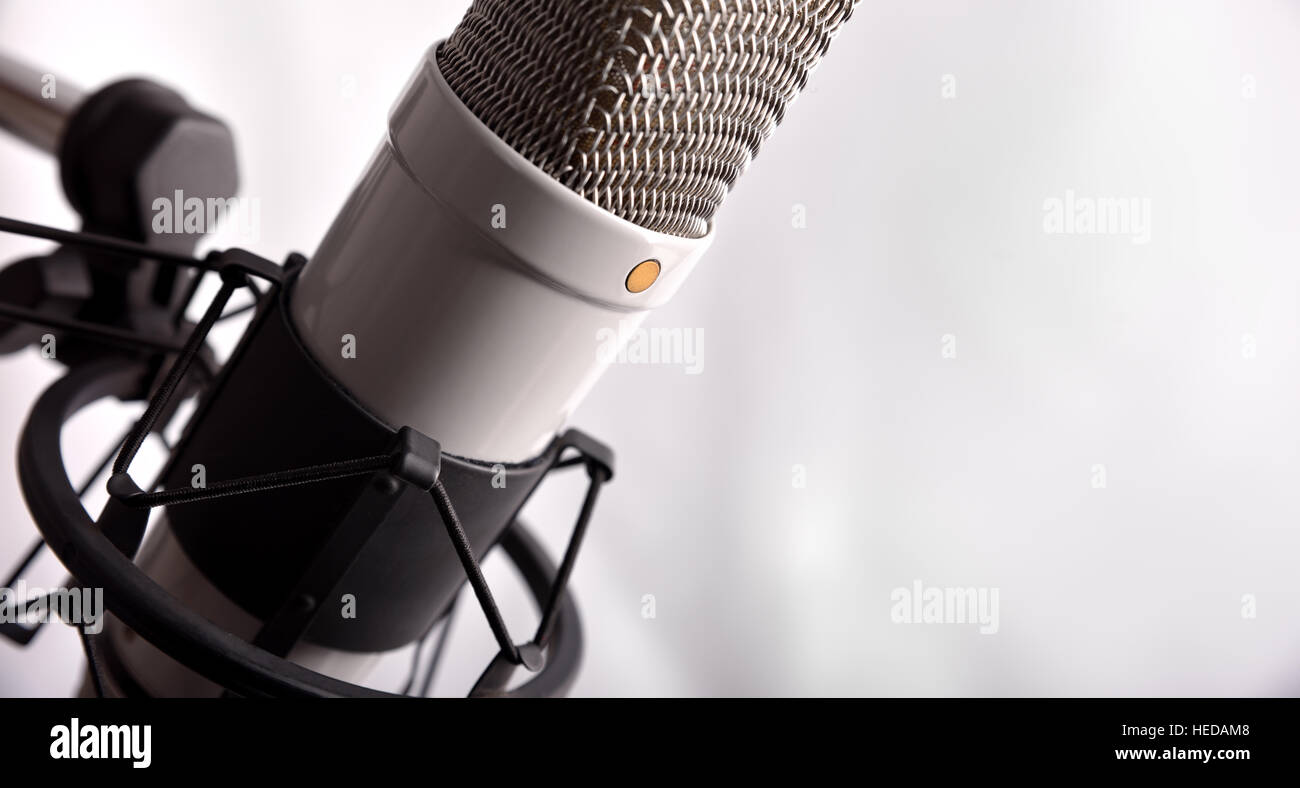 Close up studio condenser microphone with pop filter and anti-vibration ...