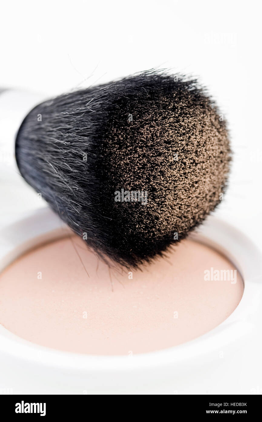 Powder brush, make-up brush and powder compact Stock Photo - Alamy
