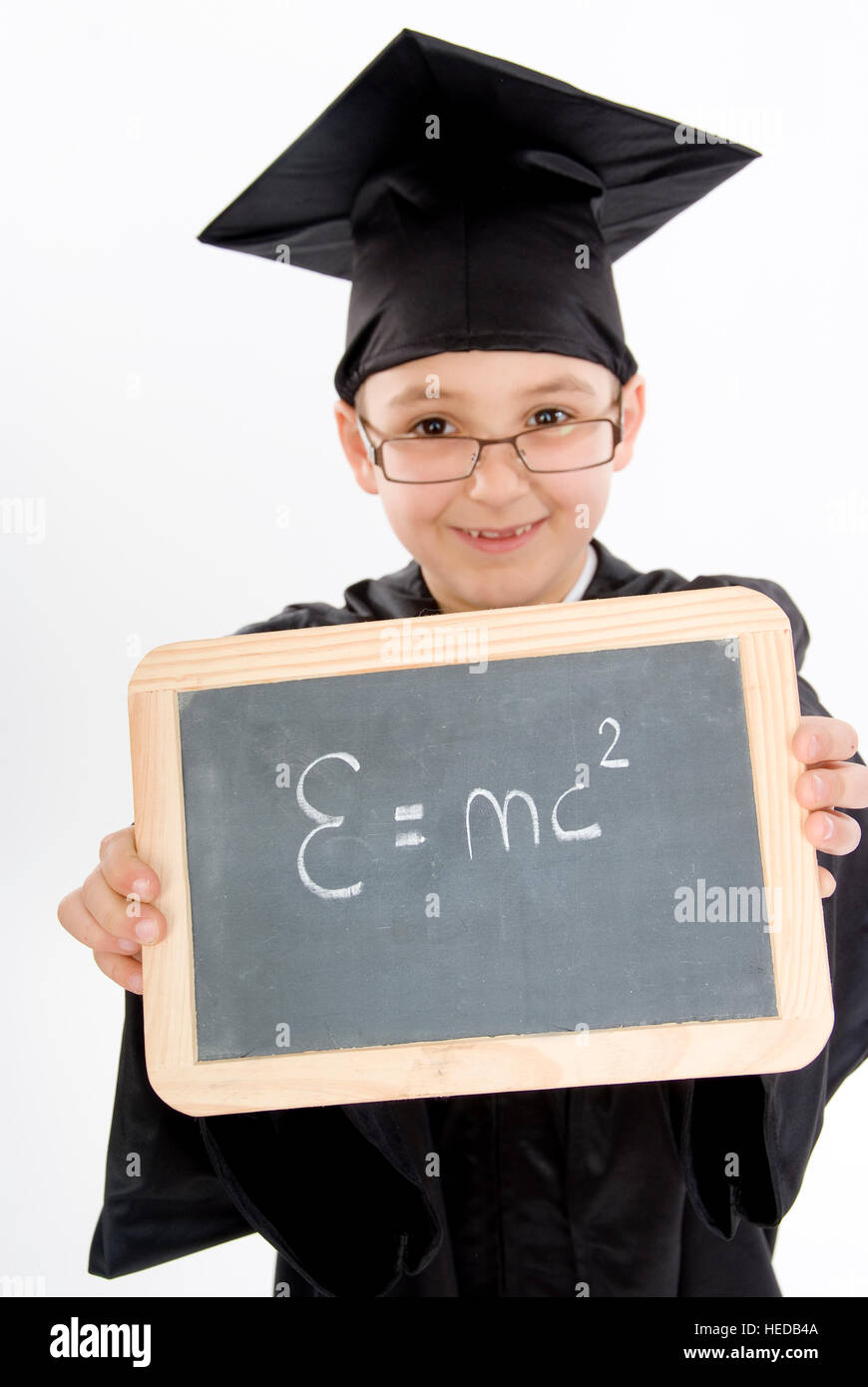 7 Year old Boy Holding A Slate Small Blackboard Theory Of Relativity 7-year-old-boy-holding-a-slate-small-blackboard-theory-of-relativity