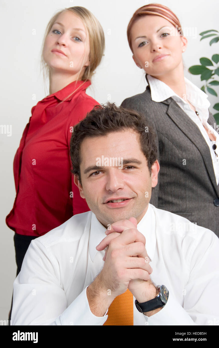 Young business man stands poses hi-res stock photography and images - Alamy