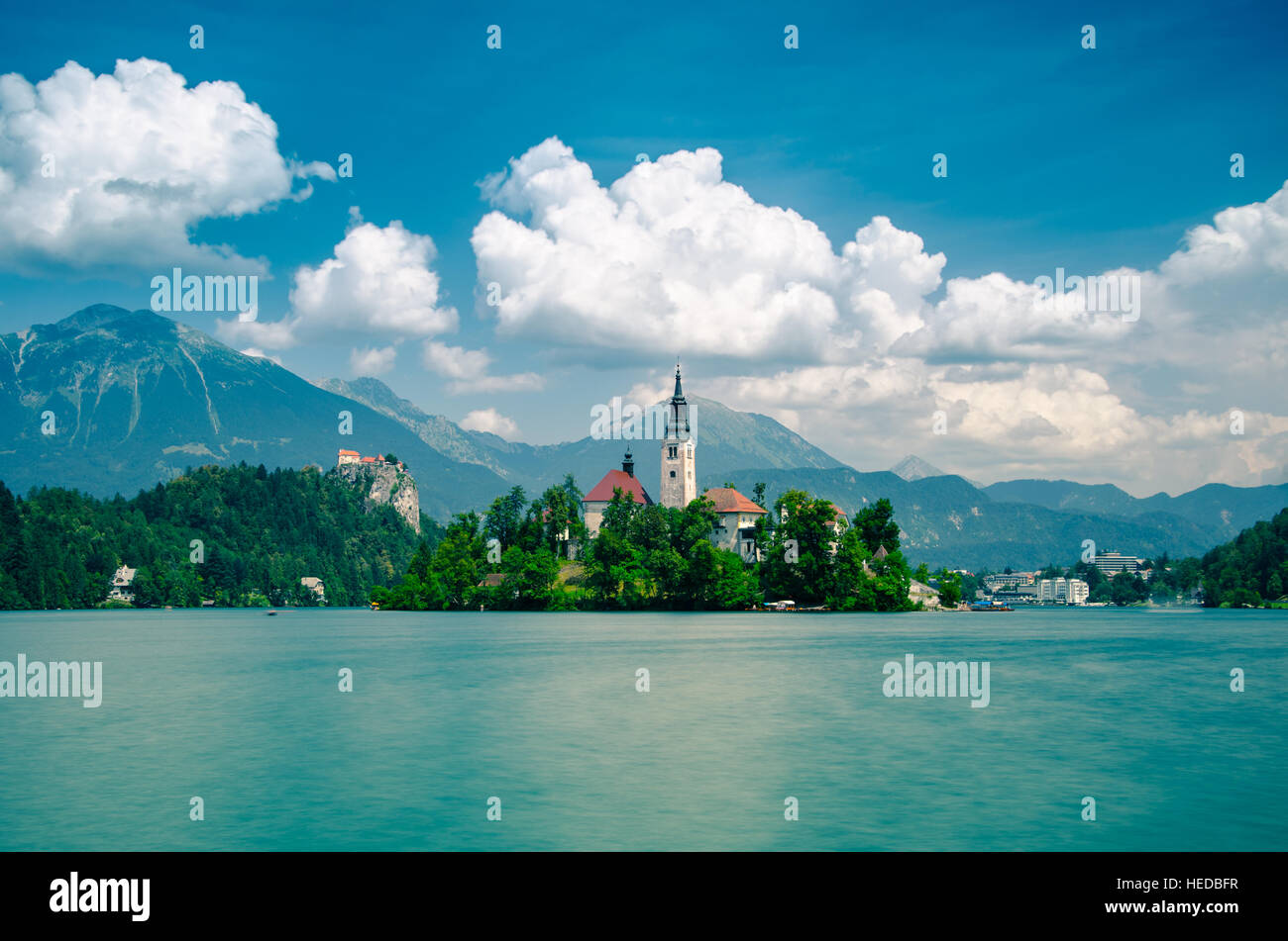 Summer scene in the park of Bled lake with St Mary's church and ...