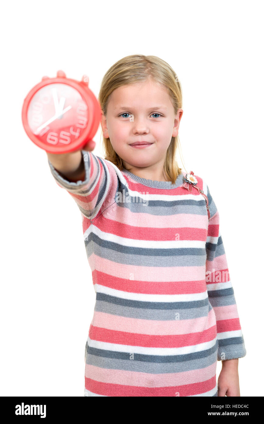 Cute girl with clock isolated over white Stock Photo - Alamy