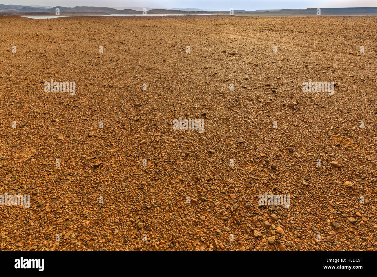 Hamada desert near Ouarzazate.. Hamada desert and the Atlas mountains ...