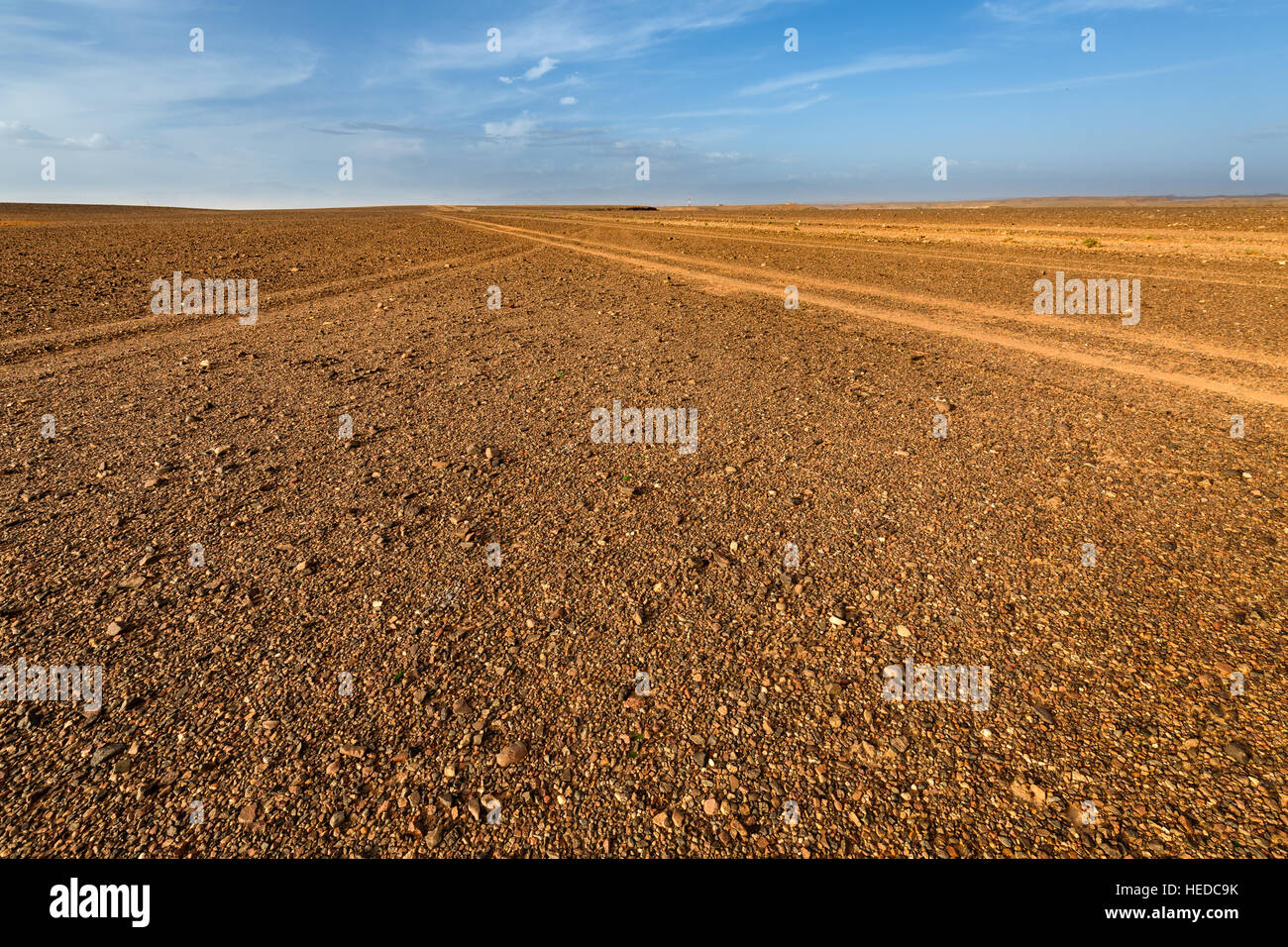 Hamada desert near Ouarzazate.. Hamada desert and the Atlas mountains ...