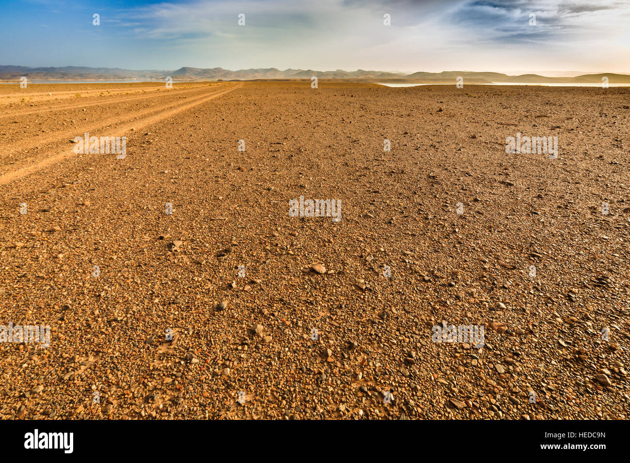 Hamada desert near Ouarzazate.. Hamada desert and the Atlas mountains ...