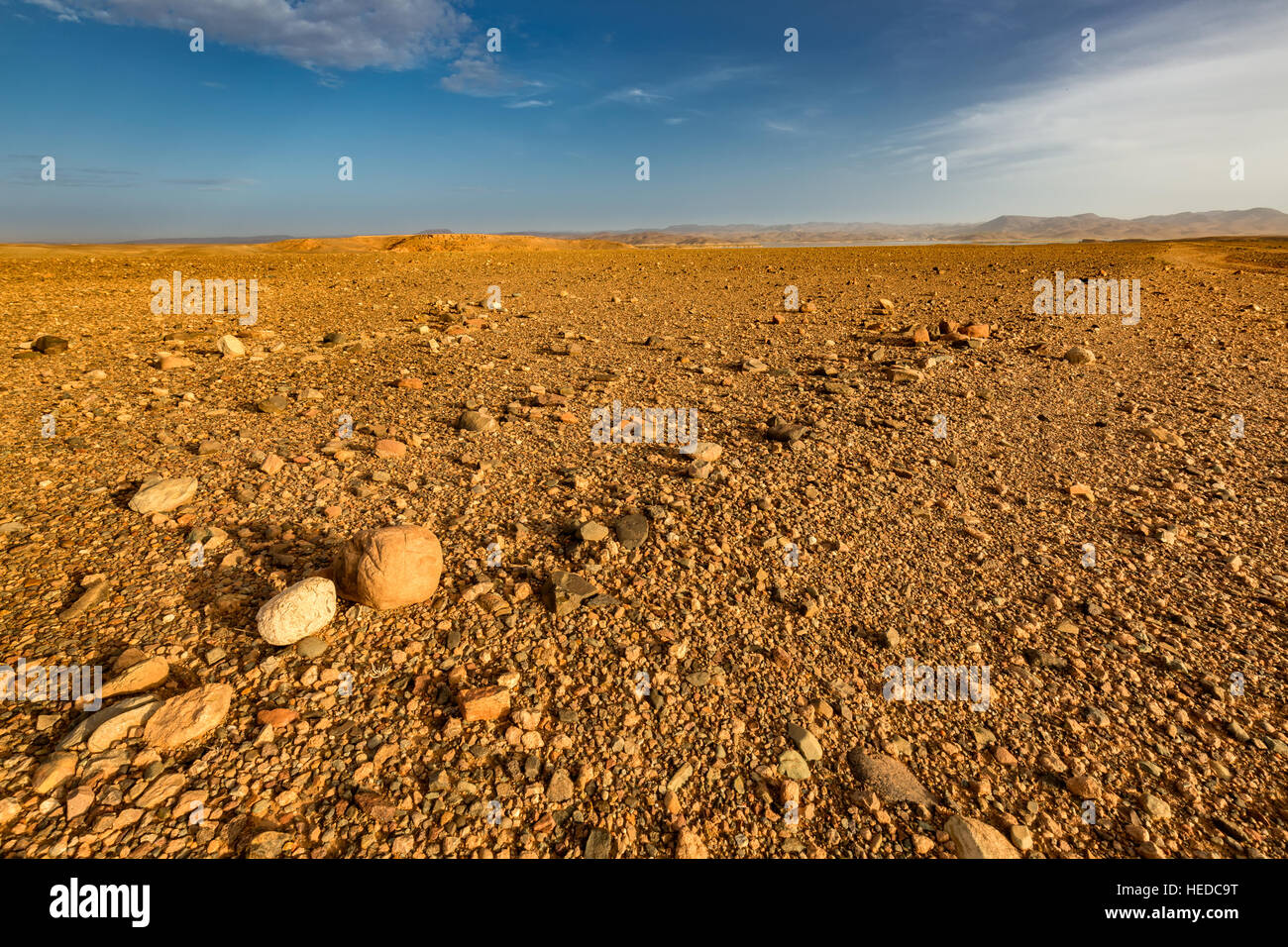 Hamada desert near Ouarzazate.. Hamada desert and the Atlas mountains ...