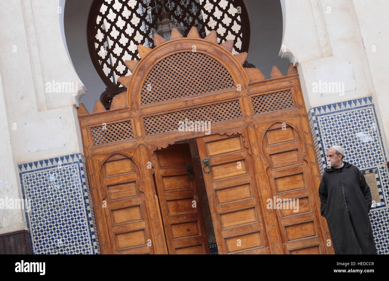 Muslim man at mosque entry in Fez, Morocco Stock Photo - Alamy