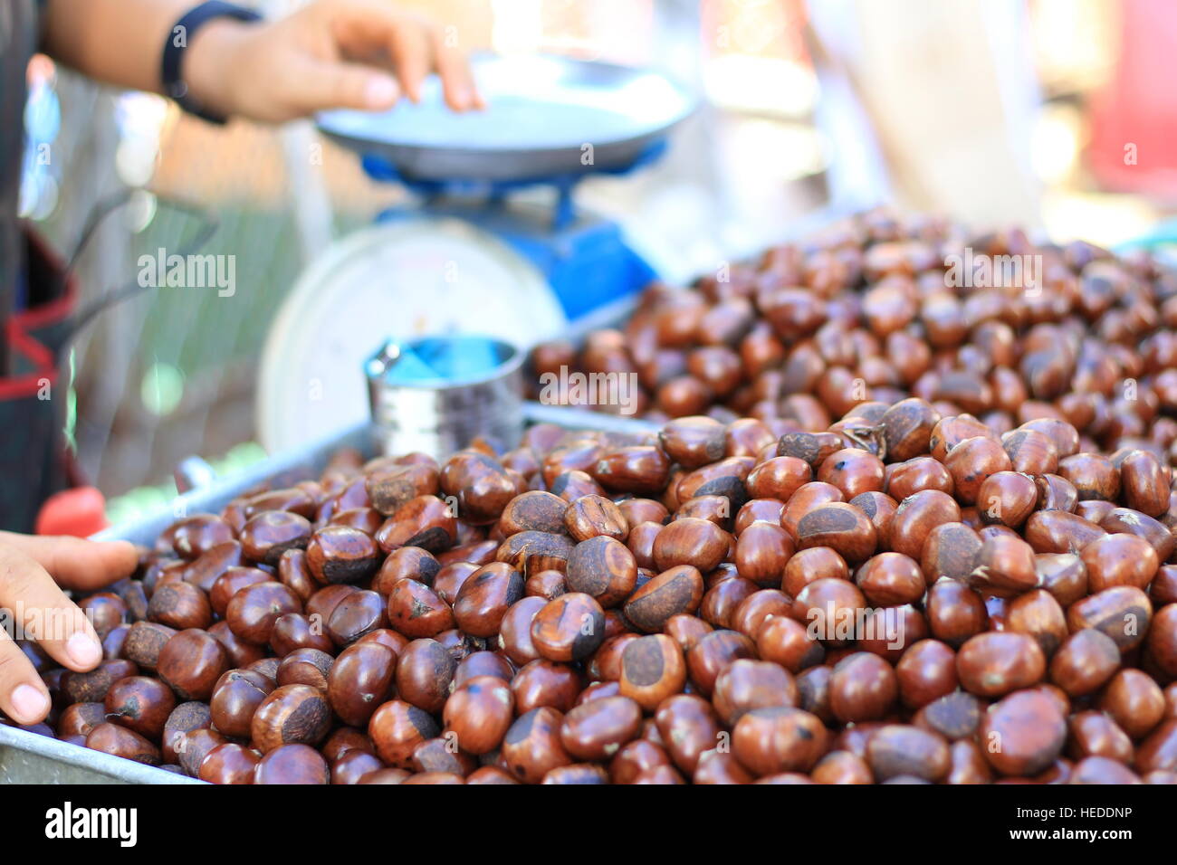 Roasted chestnuts in the local market, Thailand Stock Photo - Alamy