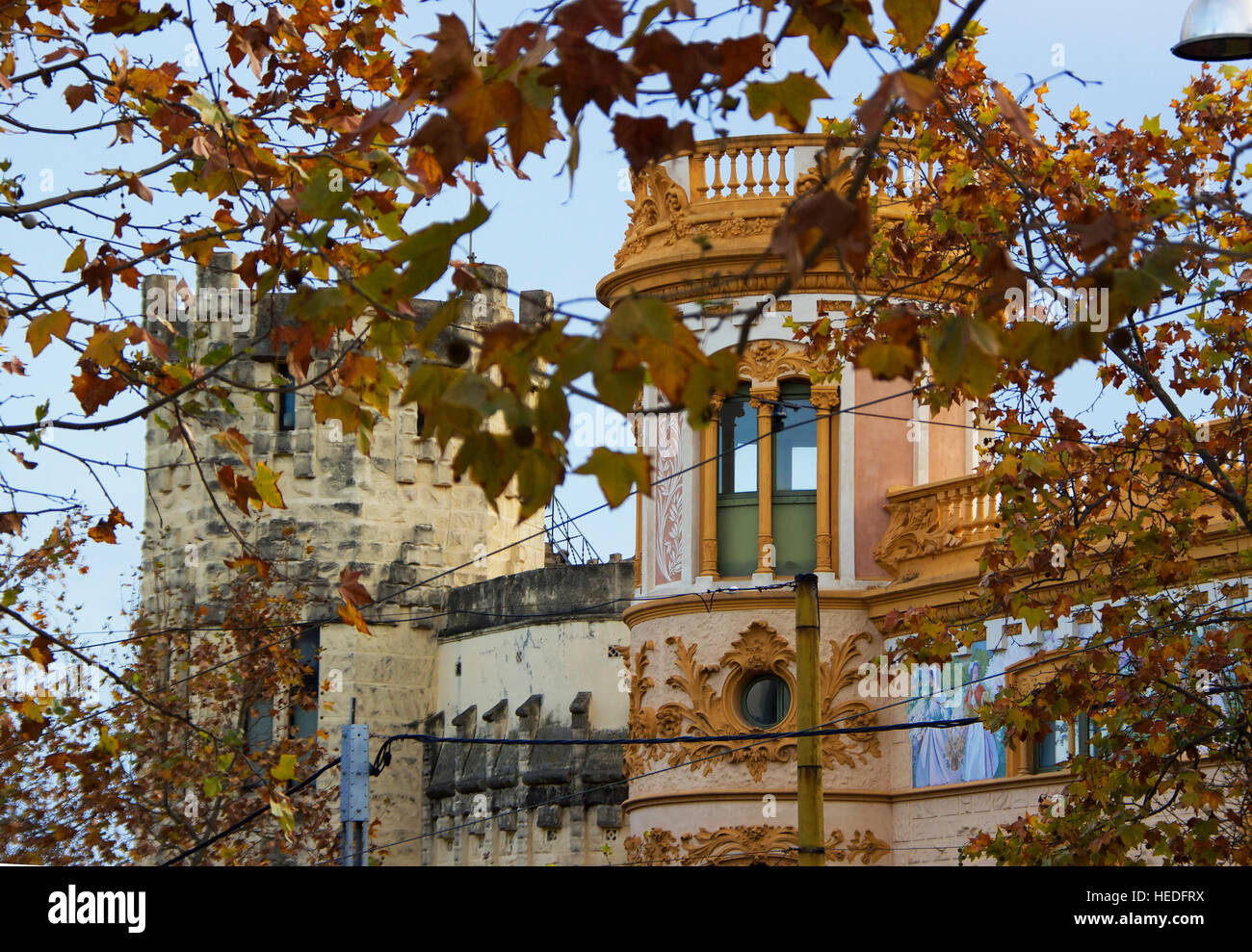 Restored gold castle wall and a stone watchtower Stock Photo - Alamy