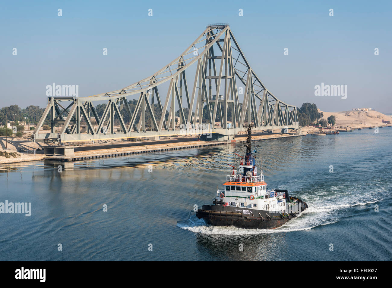 Tug Boat passes El Ferdan Railway Bridge in the Suez Canal near ...