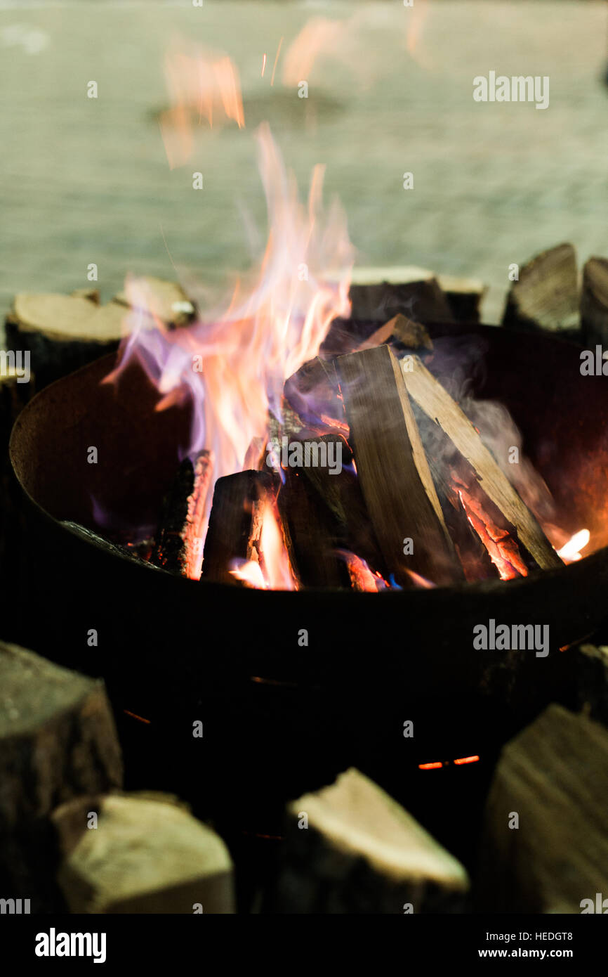fire in fireplace and flames dance outside night Stock Photo - Alamy