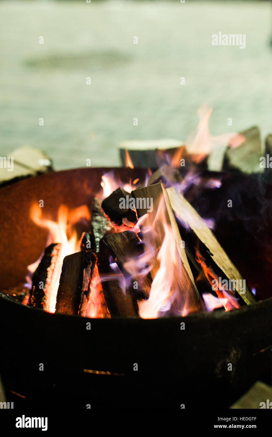 fire in fireplace and flames dance outside night Stock Photo - Alamy