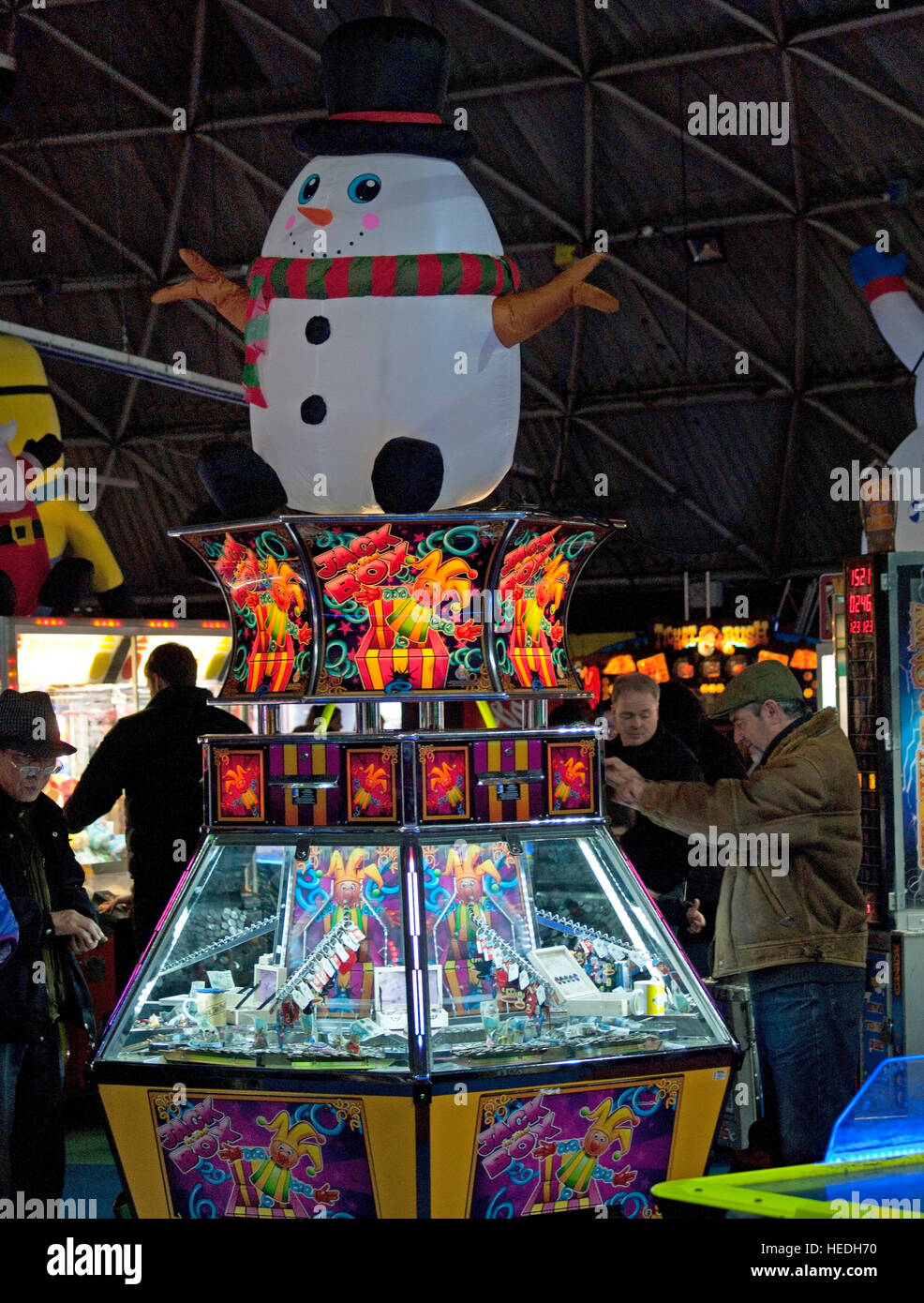 Christmas in an arcade on Brighton Pier Stock Photo - Alamy