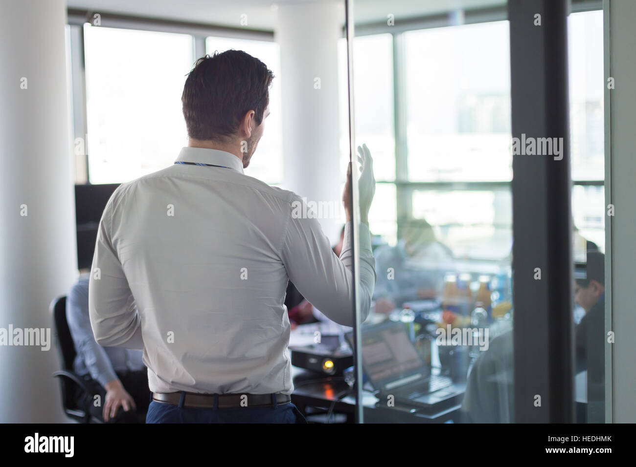 Business team leader delivering presentation in office Stock Photo - Alamy