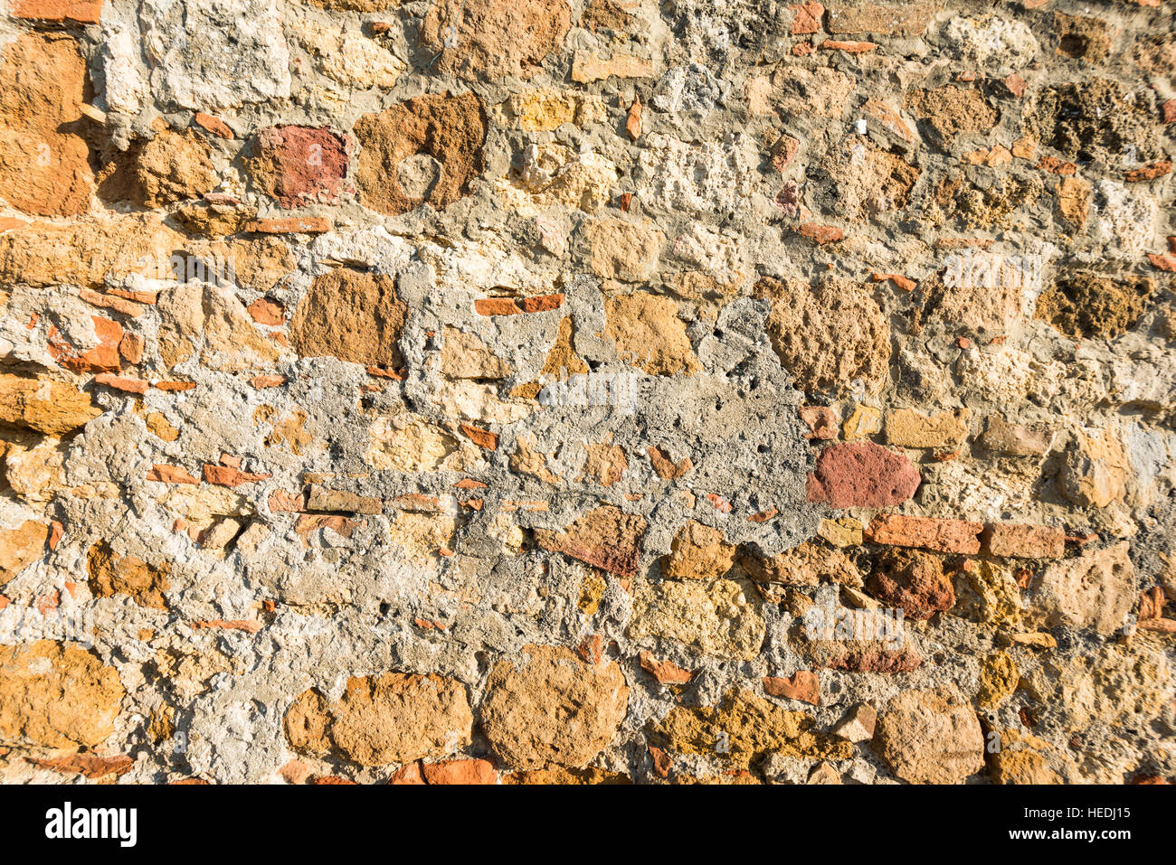 Close up view of an aged textured plastered stone wall Stock Photo - Alamy