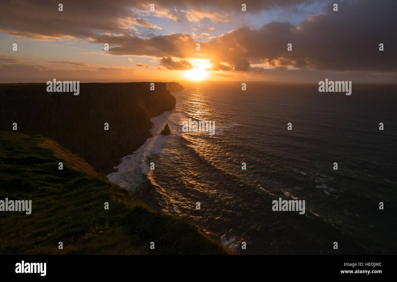 Cliffs of Moher in Ireland at sunset, shot counter light Stock Photo ...