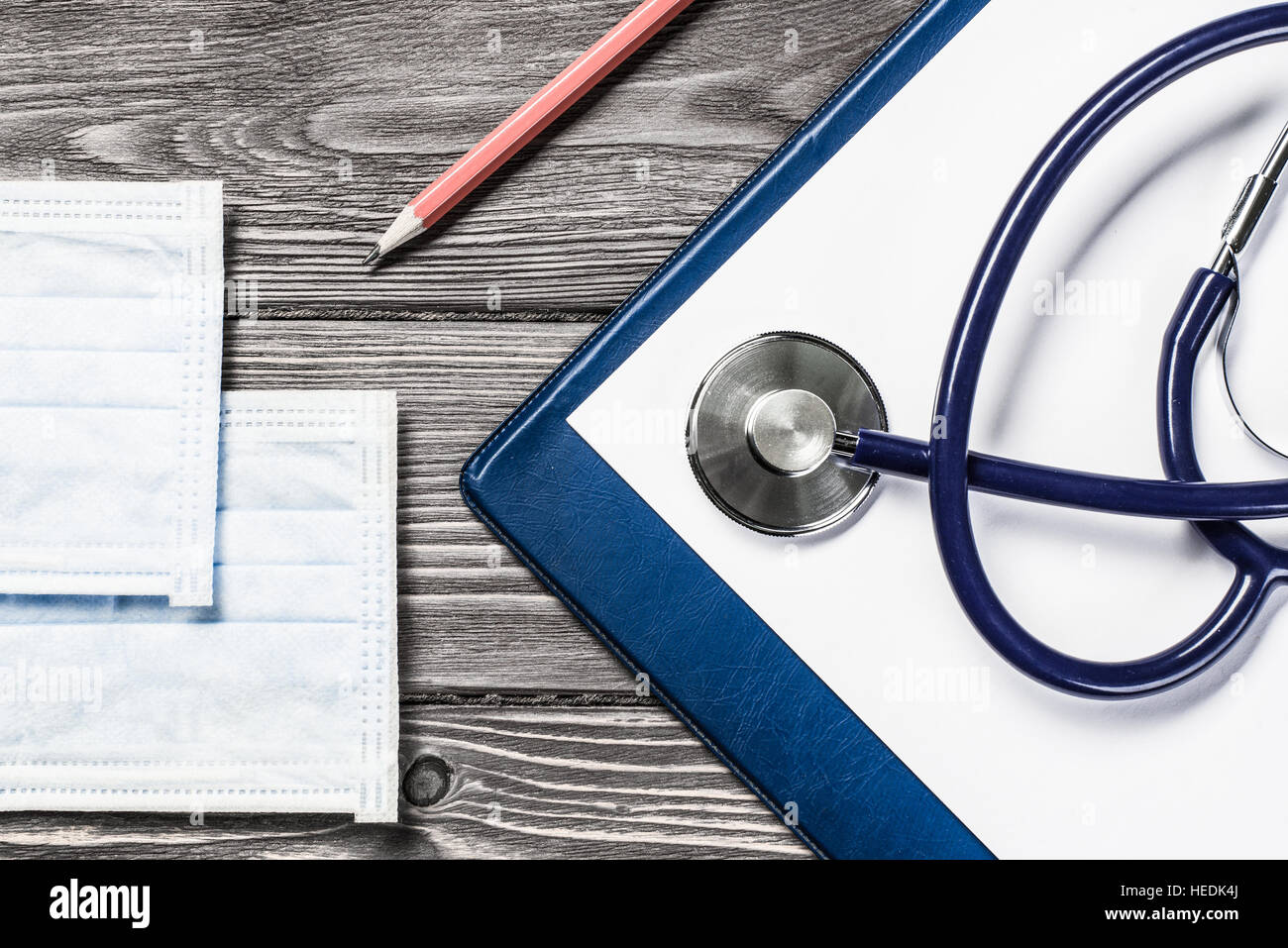 Desk of doctor with medicine things Stock Photo - Alamy