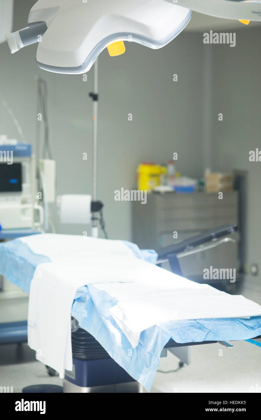 Hospital surgery bed in operating theater emergency room prepared for ...