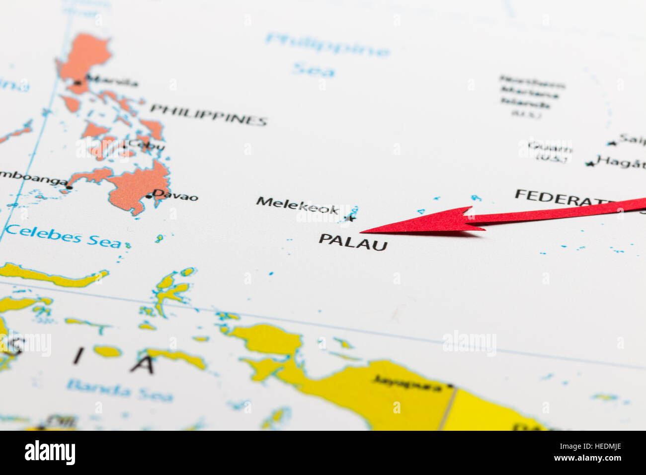 Red arrow pointing Palau on the map of Pacific ocean Stock Photo - Alamy