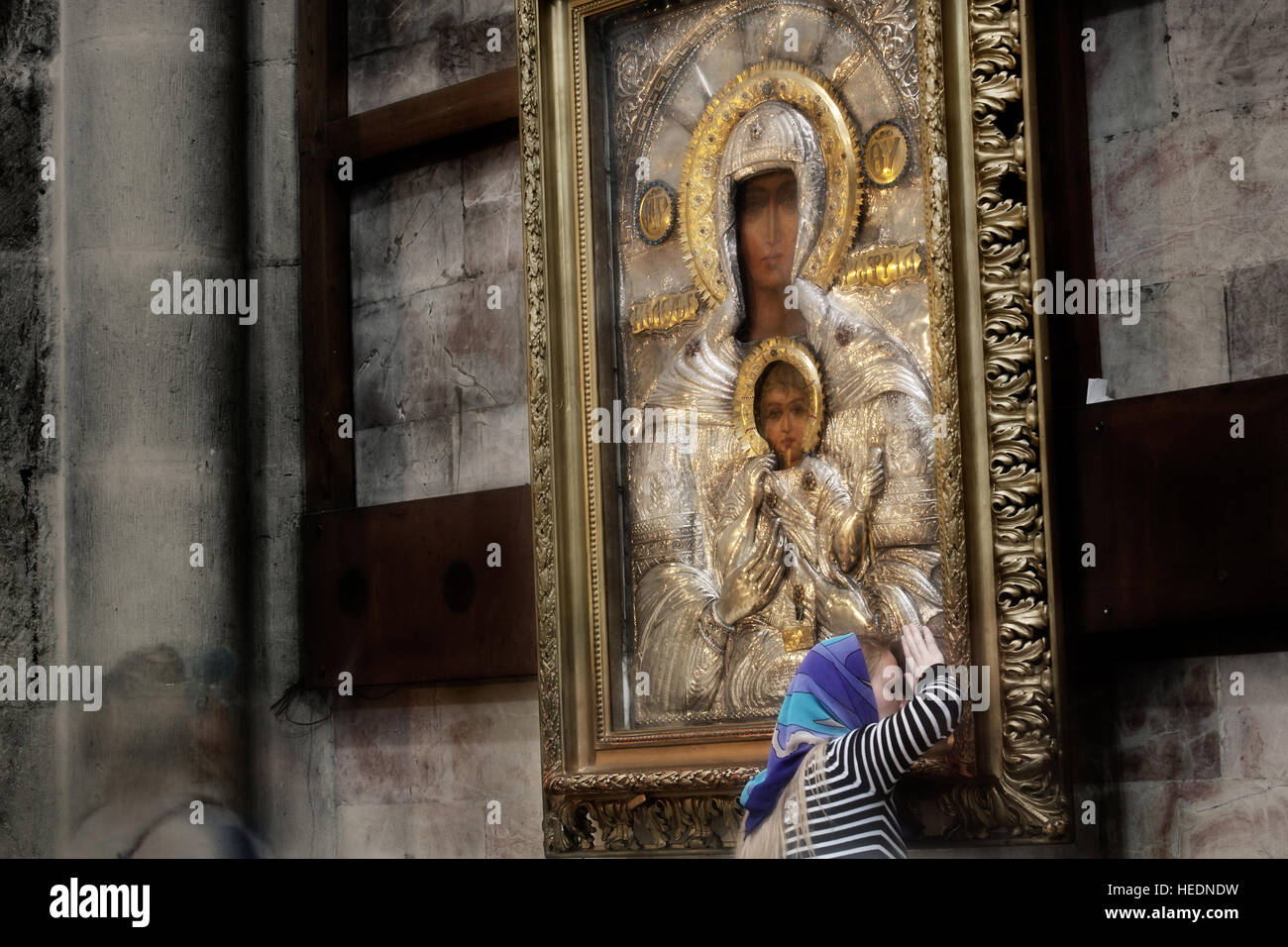 Jerusalem, Israel - December 4, 2013: Orthodox pilgrim prays at the ...