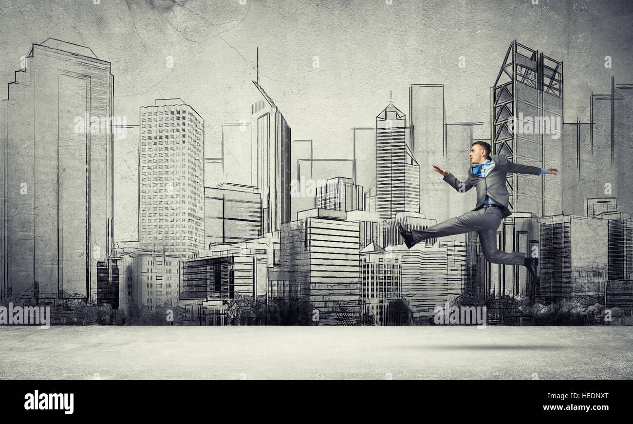 Businessman jumping high Stock Photo - Alamy