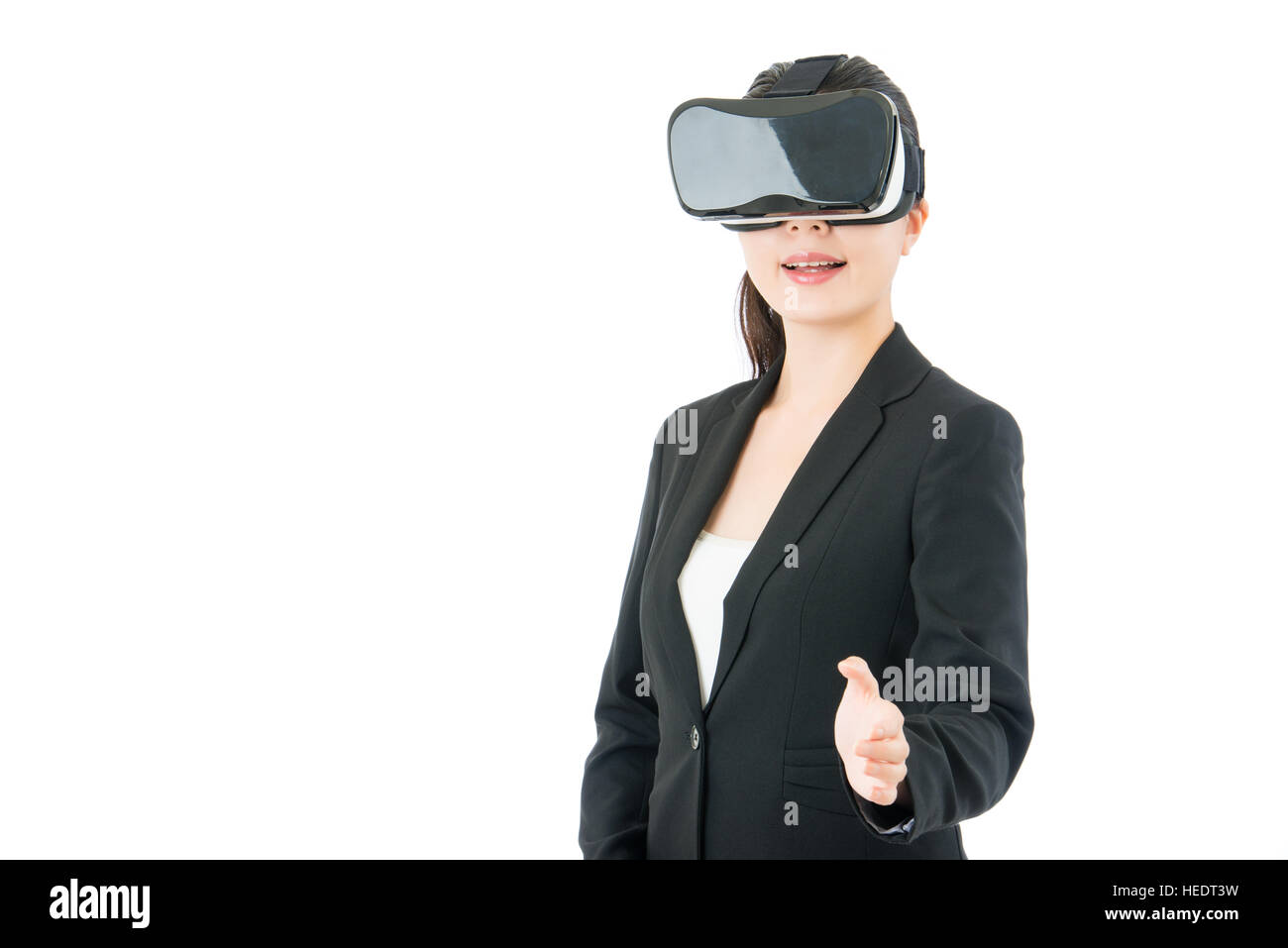 asian business woman handshake by virtual reality. VR headset glasses ...