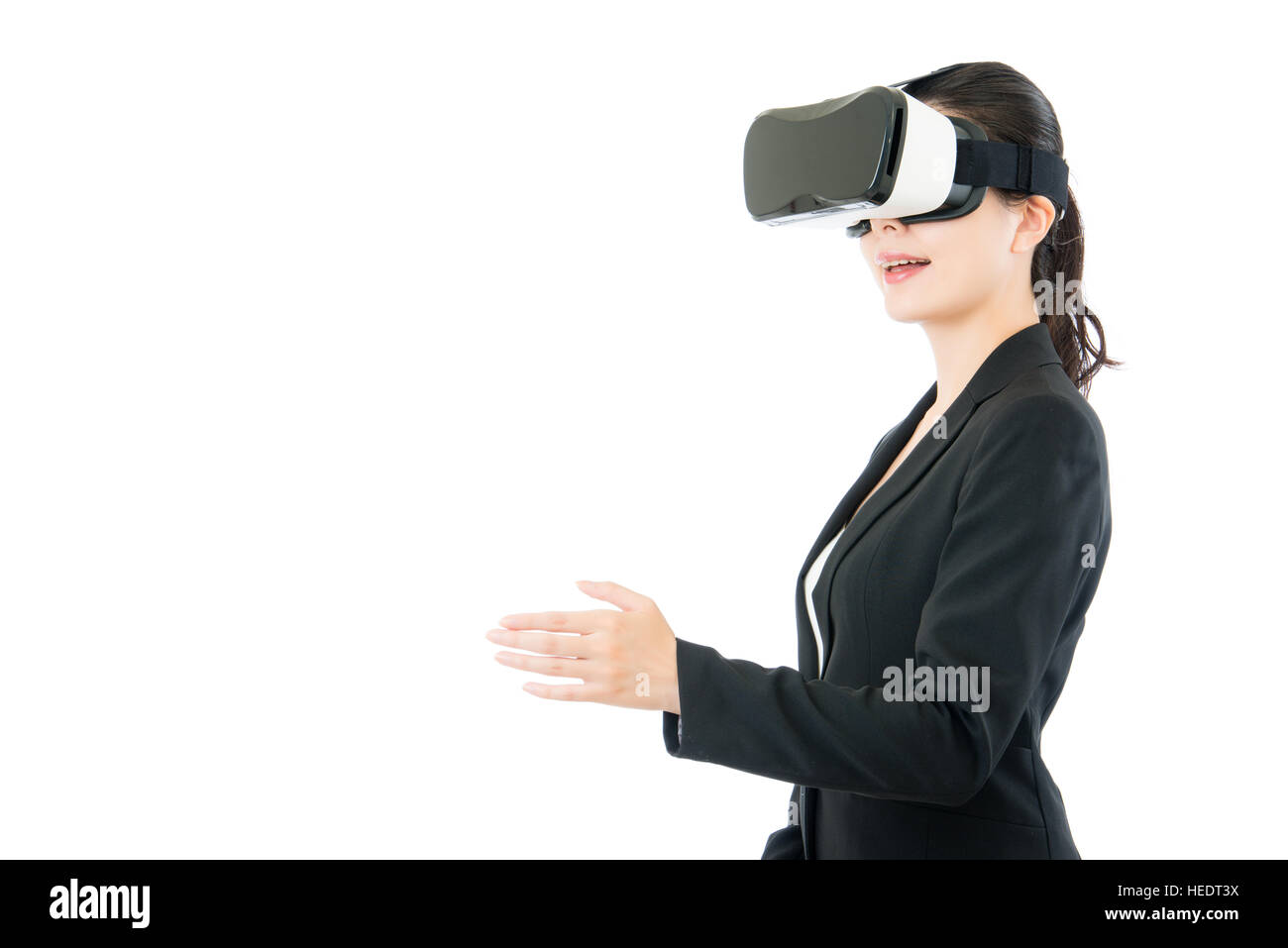 asian business woman handshake by virtual reality. VR headset glasses ...