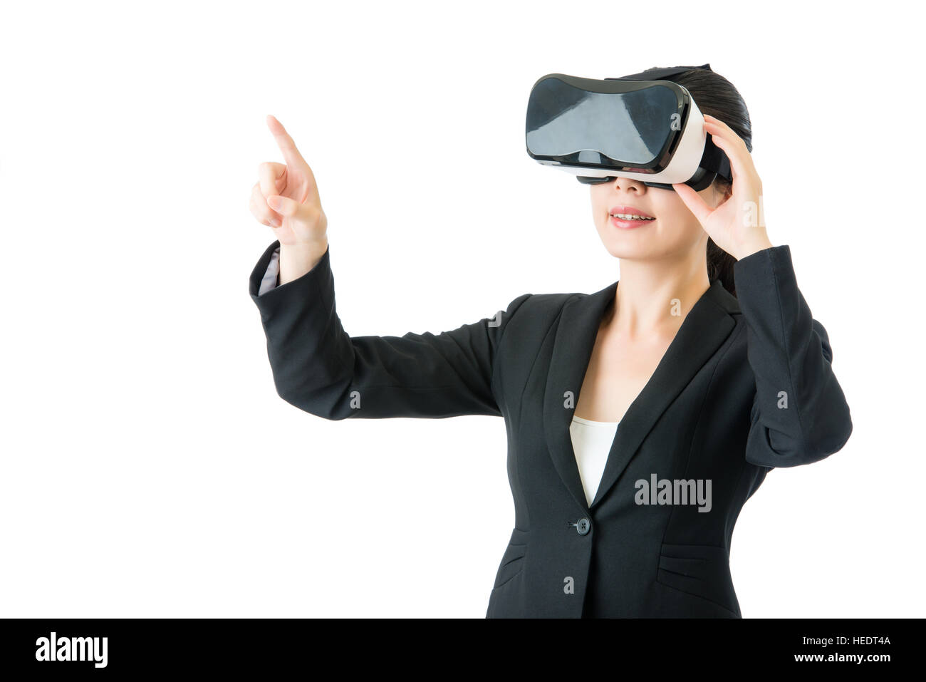 asian business woman pressing screen by virtual reality. VR headset ...