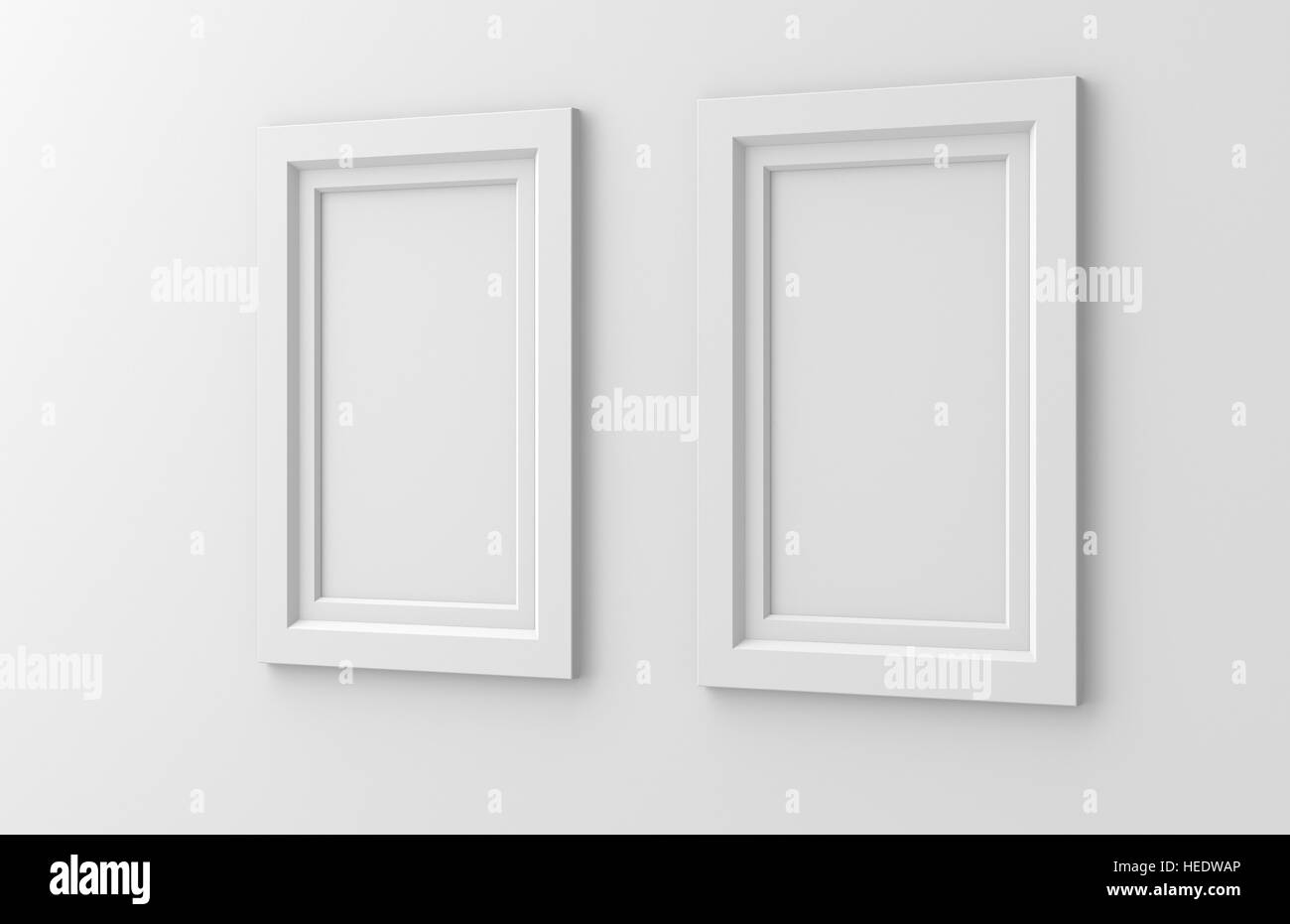 two right tilt blank photo frames hanging on the wall, 3d rendering ...