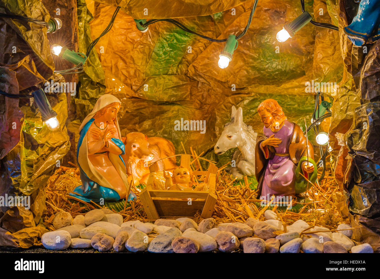 Christmas nativity scene of Holy Baby Jesus in the manger with Blessed ...