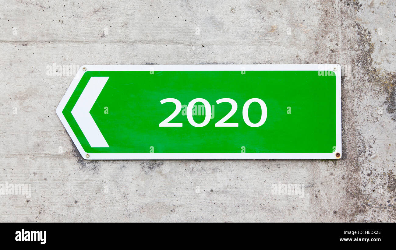 Green sign on a concrete wall - New year - 2020 Stock Photo - Alamy
