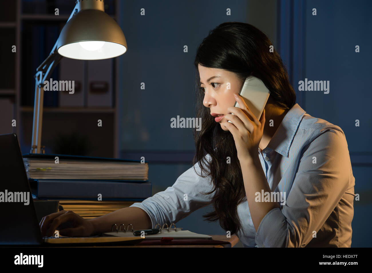 Business woman working night on hi-res stock photography and images - Alamy