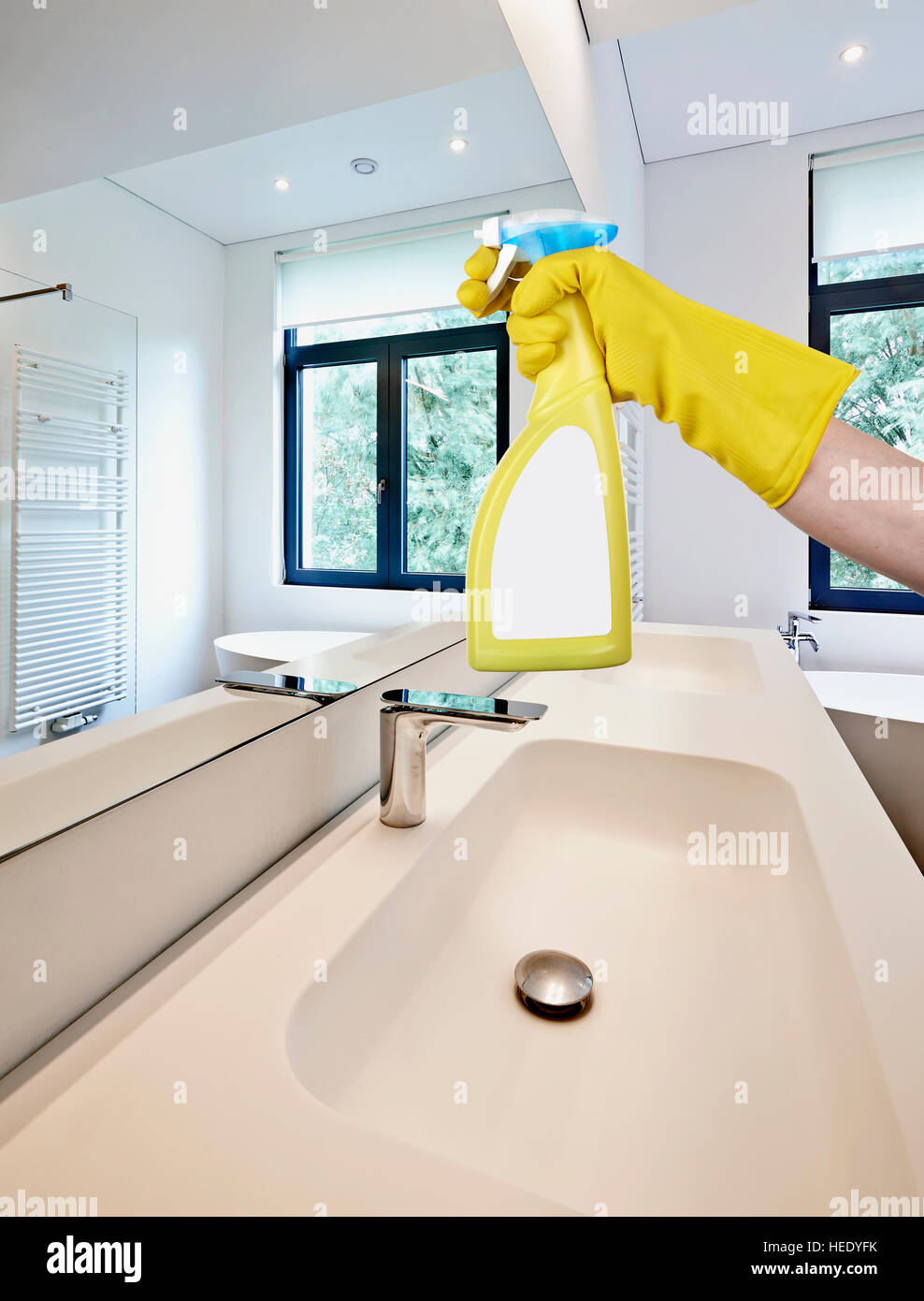 Cleaning mirror in the bathroom on a stylish interior Stock Photo - Alamy