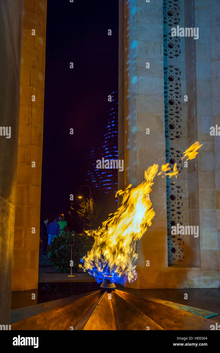 Eternal fire burning at Dagustu park at night, Baku, Azerbaijan Stock ...