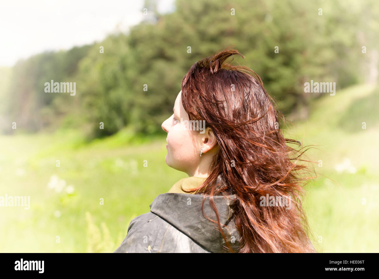 old ragged clothes. girl in a vintage coat chemical protection used in ...