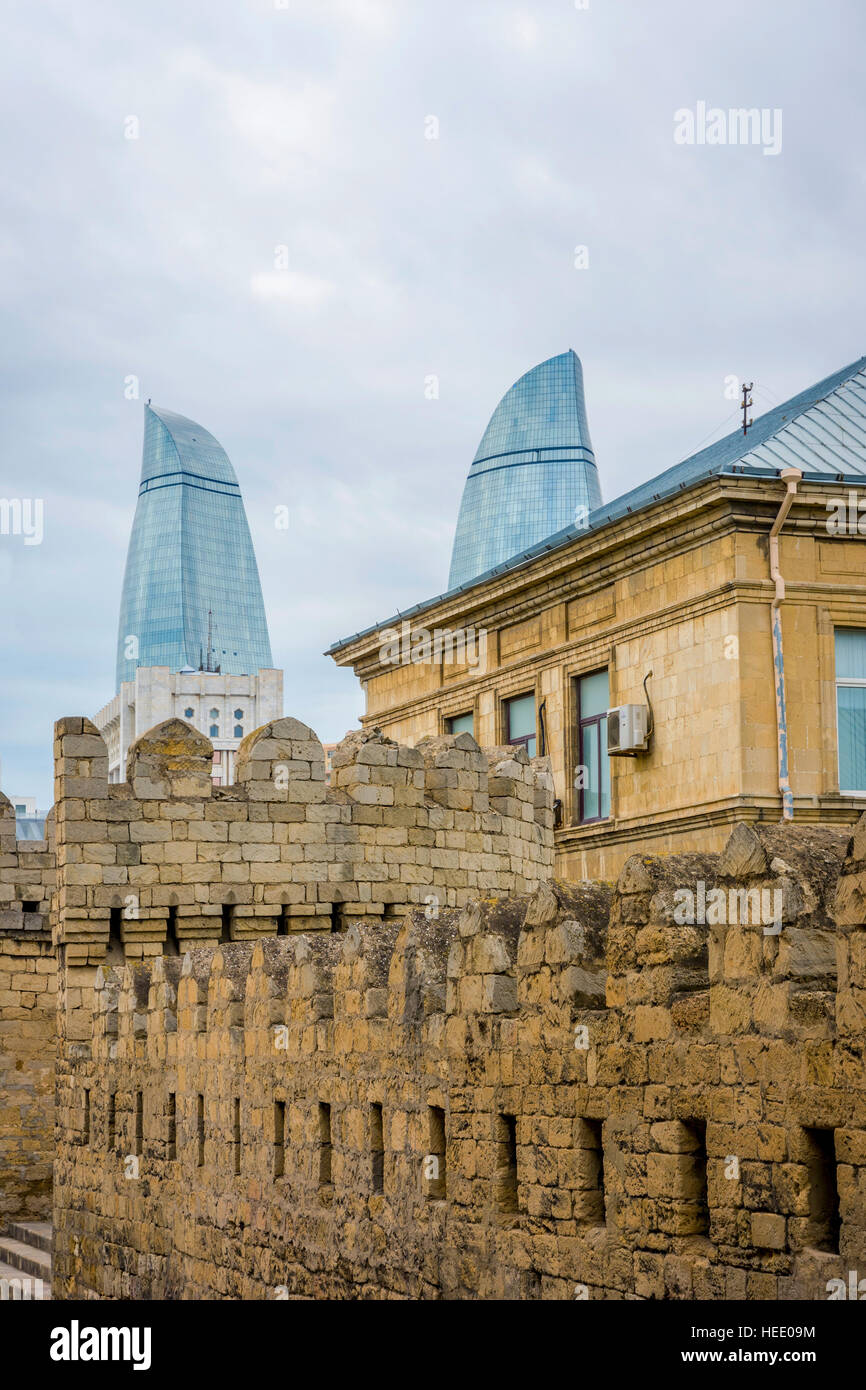 Baku old town city wall and flame towers behind, Azerbaijan Stock Photo ...