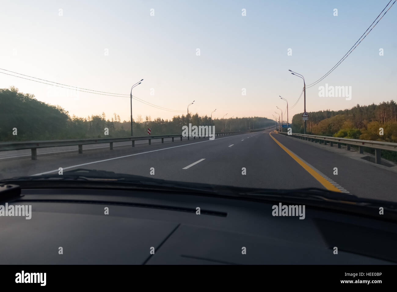 Car on empty road hi-res stock photography and images - Alamy